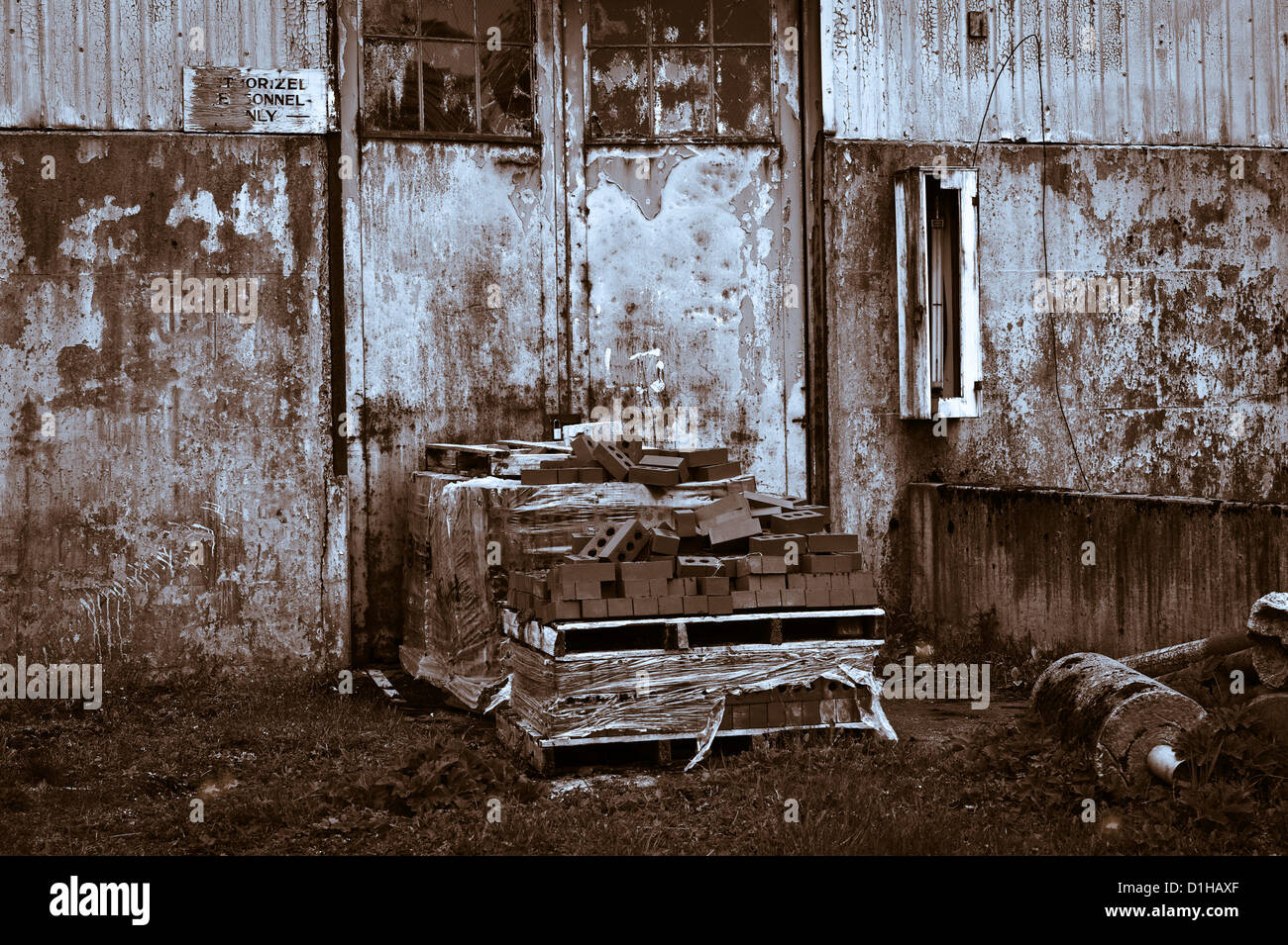 New bricks stacked on pallets outside old World War II US Navy base ...