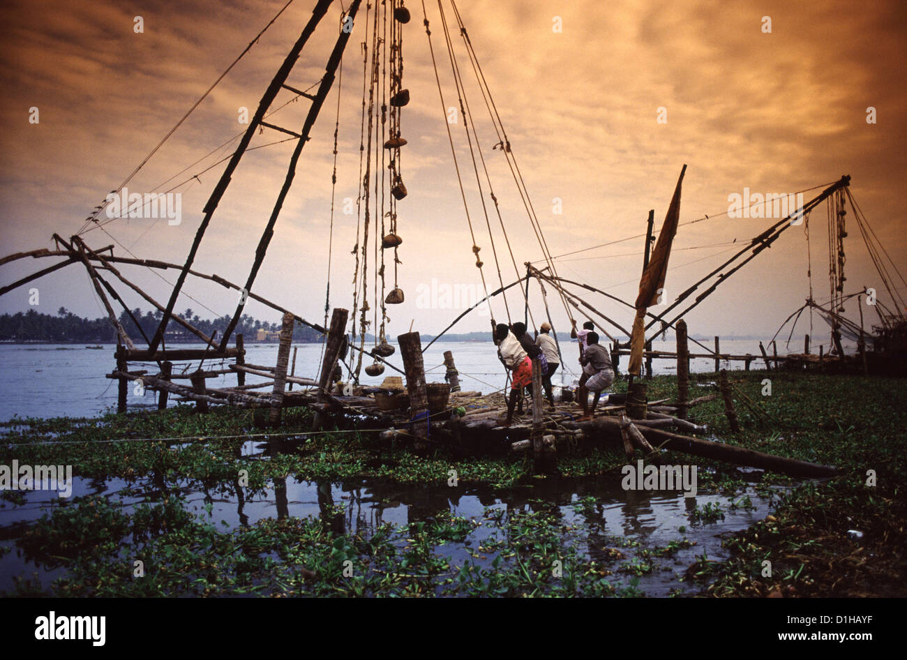 Fishermen manually operate gigantic 10-meter-high lift nets named ...
