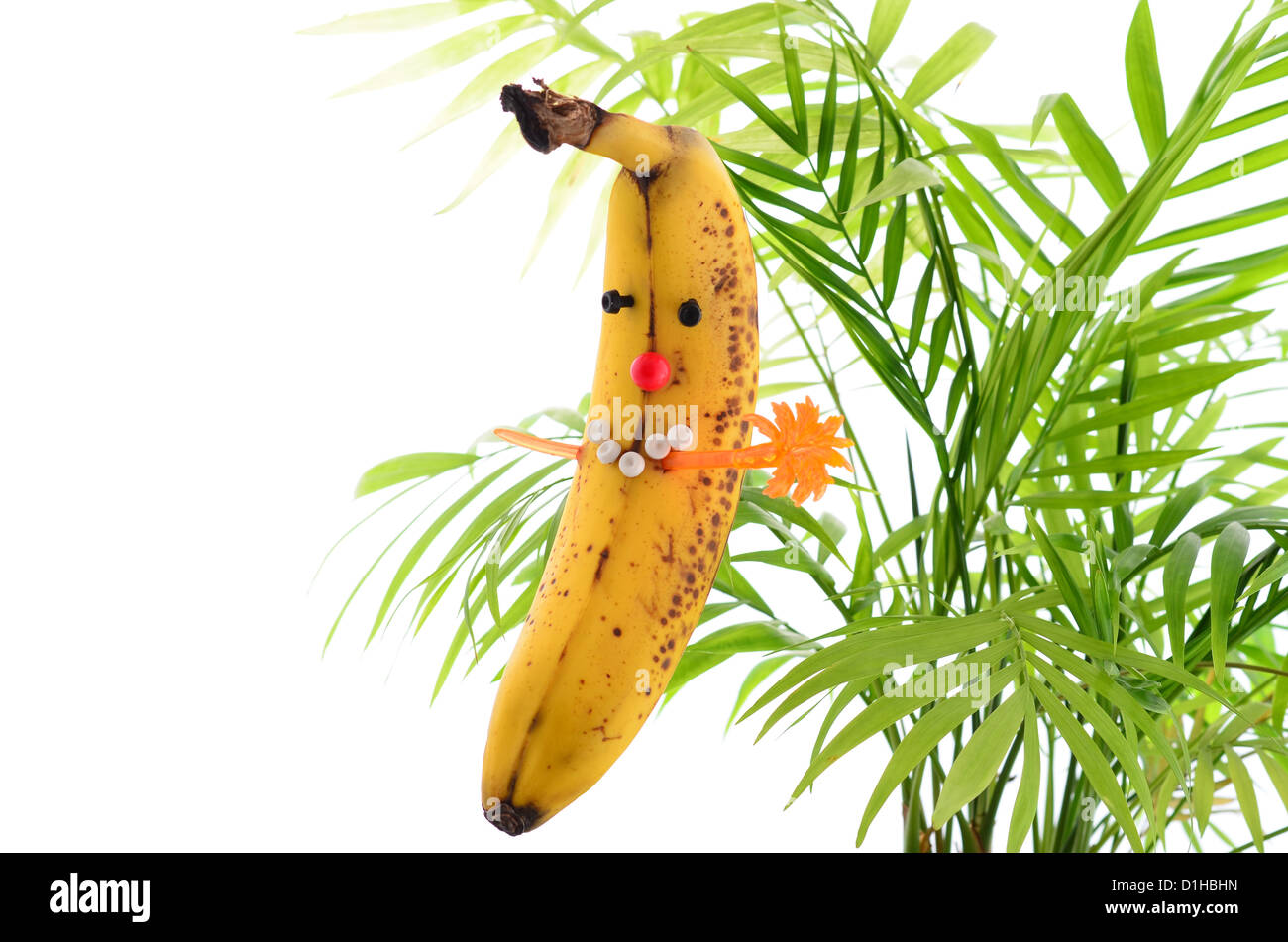 Funny banana plays master mind, smart fruit on white Stock Photo - Alamy