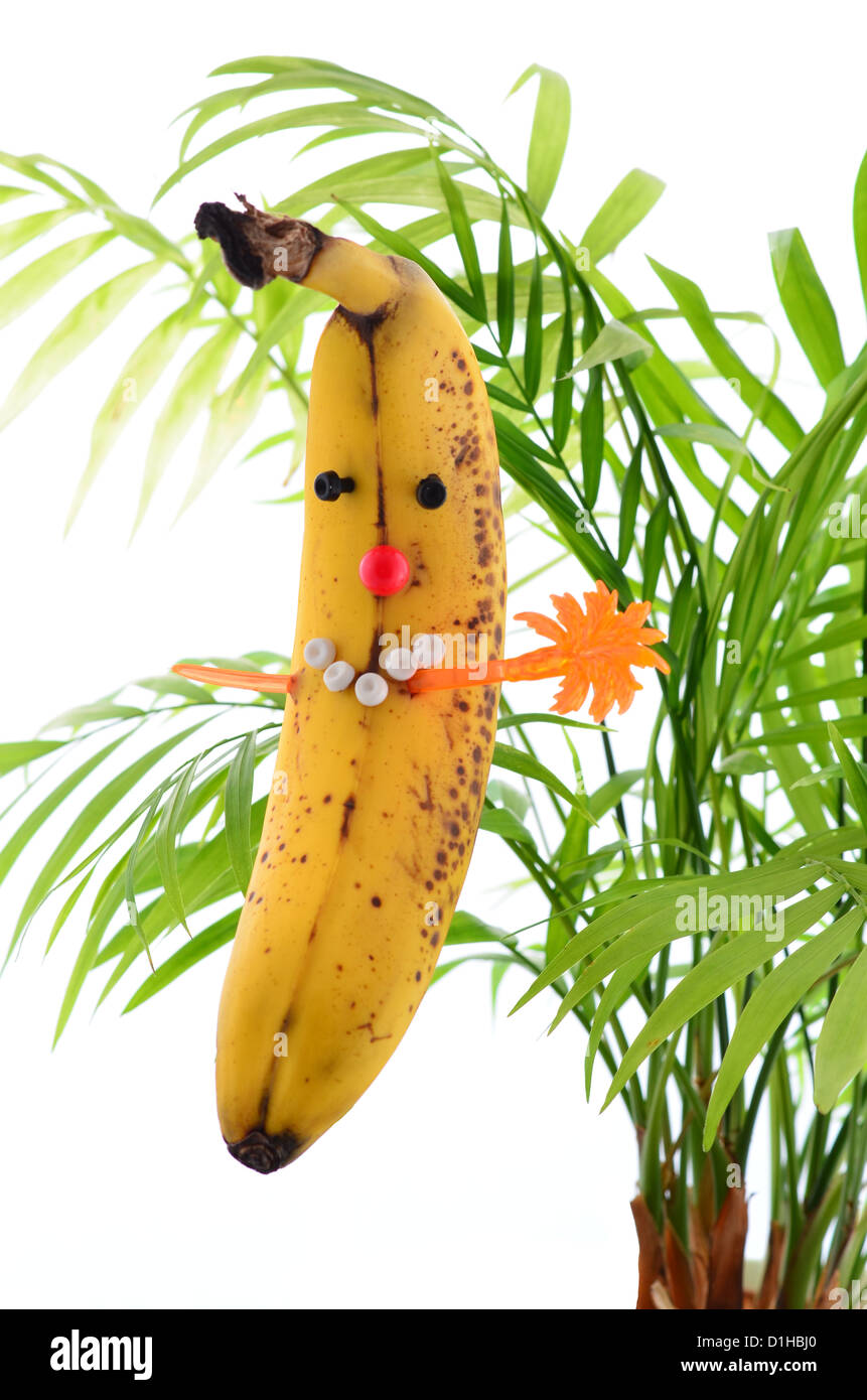 Funny banana plays master mind, smart fruit on white Stock Photo - Alamy