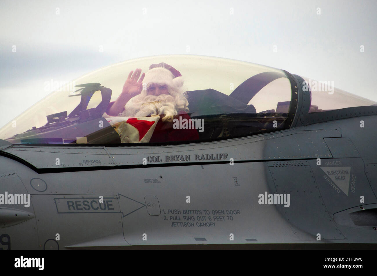 US Air Force pilot Col. Bryan Radliff dressed as Santa Claus arrives in ...