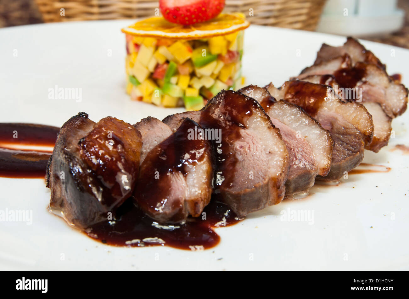 Meat roasted on a grill with vegetables Stock Photo - Alamy