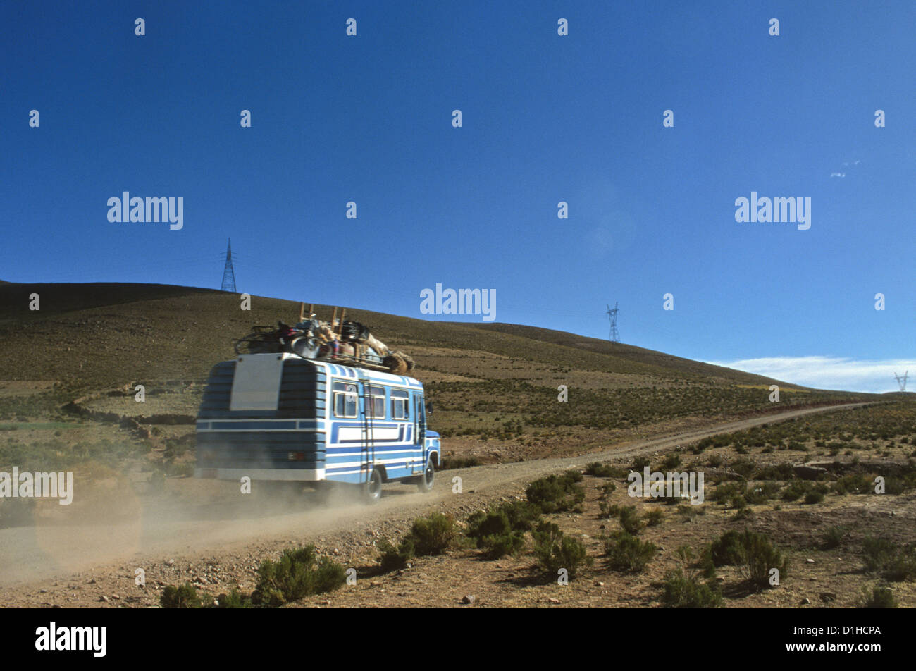 Bus carrying passengers in the Andes region of Bolivia Stock Photo - Alamy