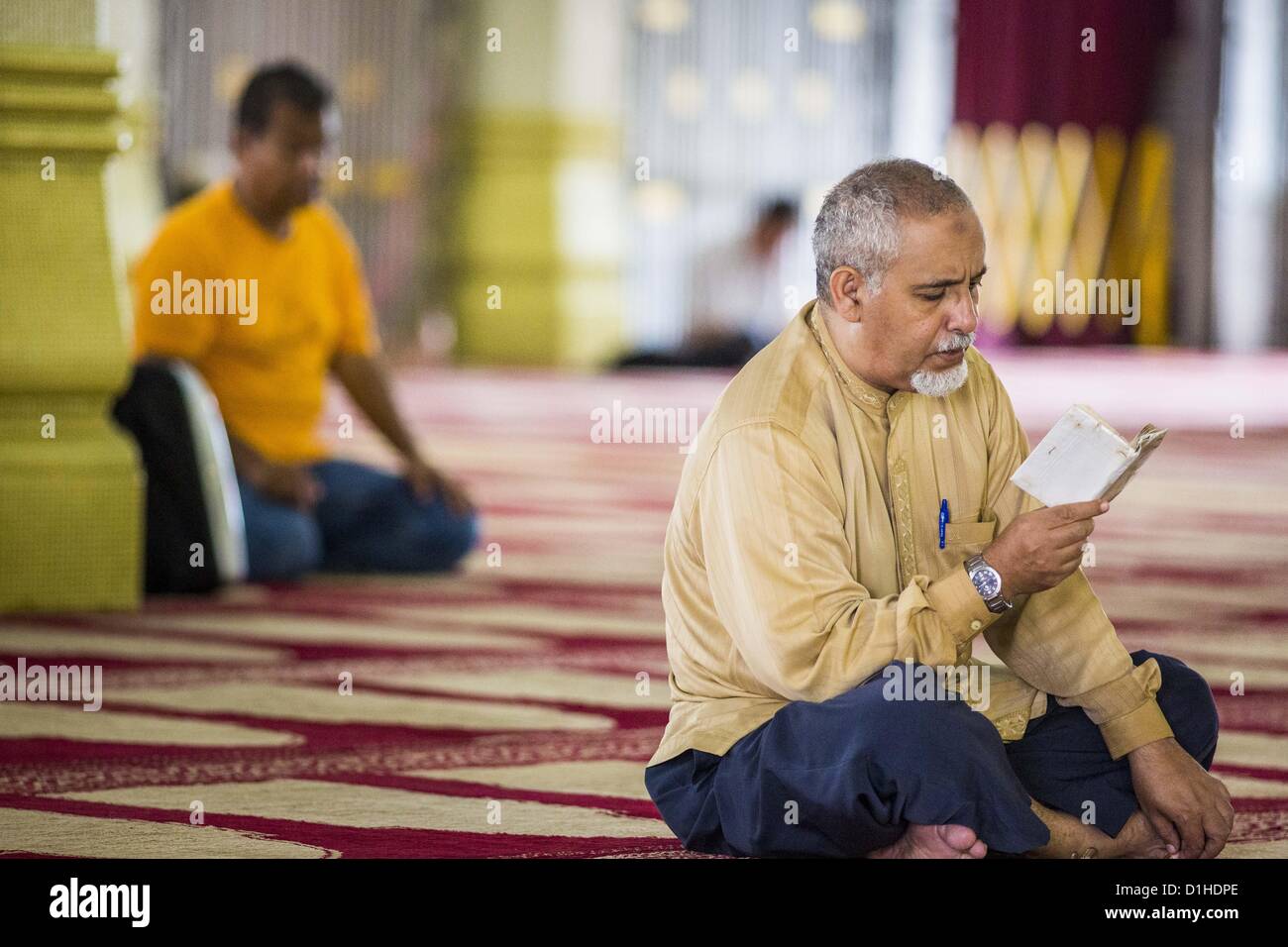 Dec. 22, 2012 - Singapore, Singapore - Men pray in the main prayer hall ...