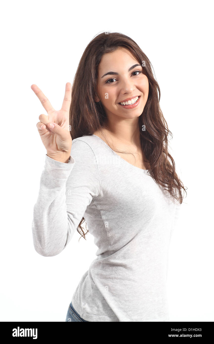 Young beautiful woman making victory sign on a white isolated ...
