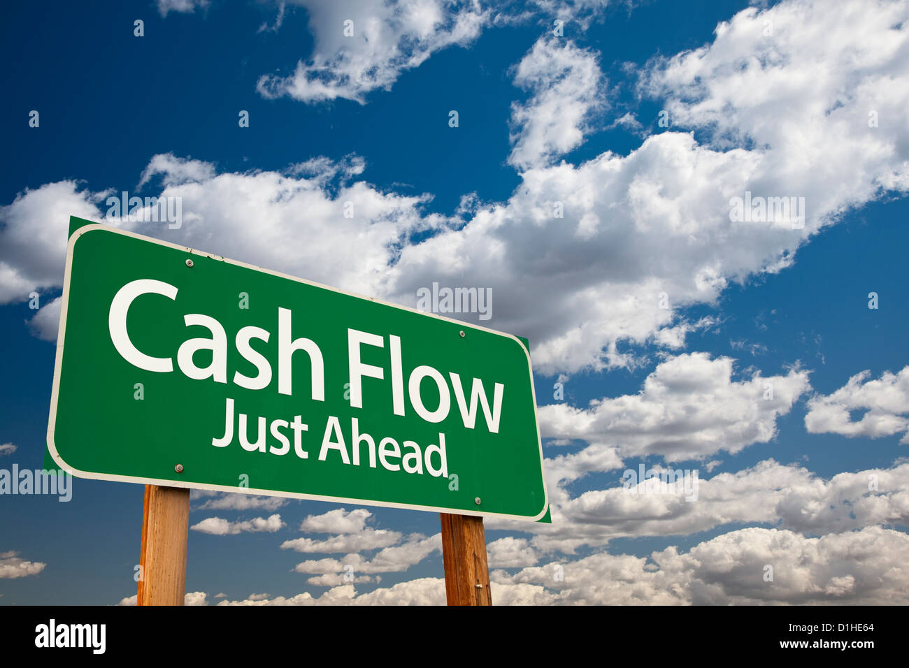 Cash Flow Green Road Sign Over Dramatic Clouds and Sky Stock Photo - Alamy