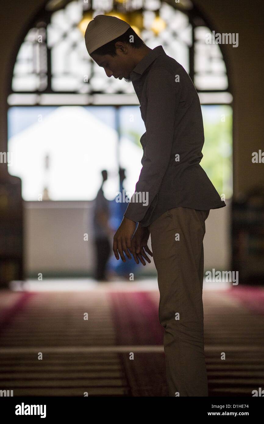 Dec. 22, 2012 - Singapore - A man prays in the main prayer hall at the ...