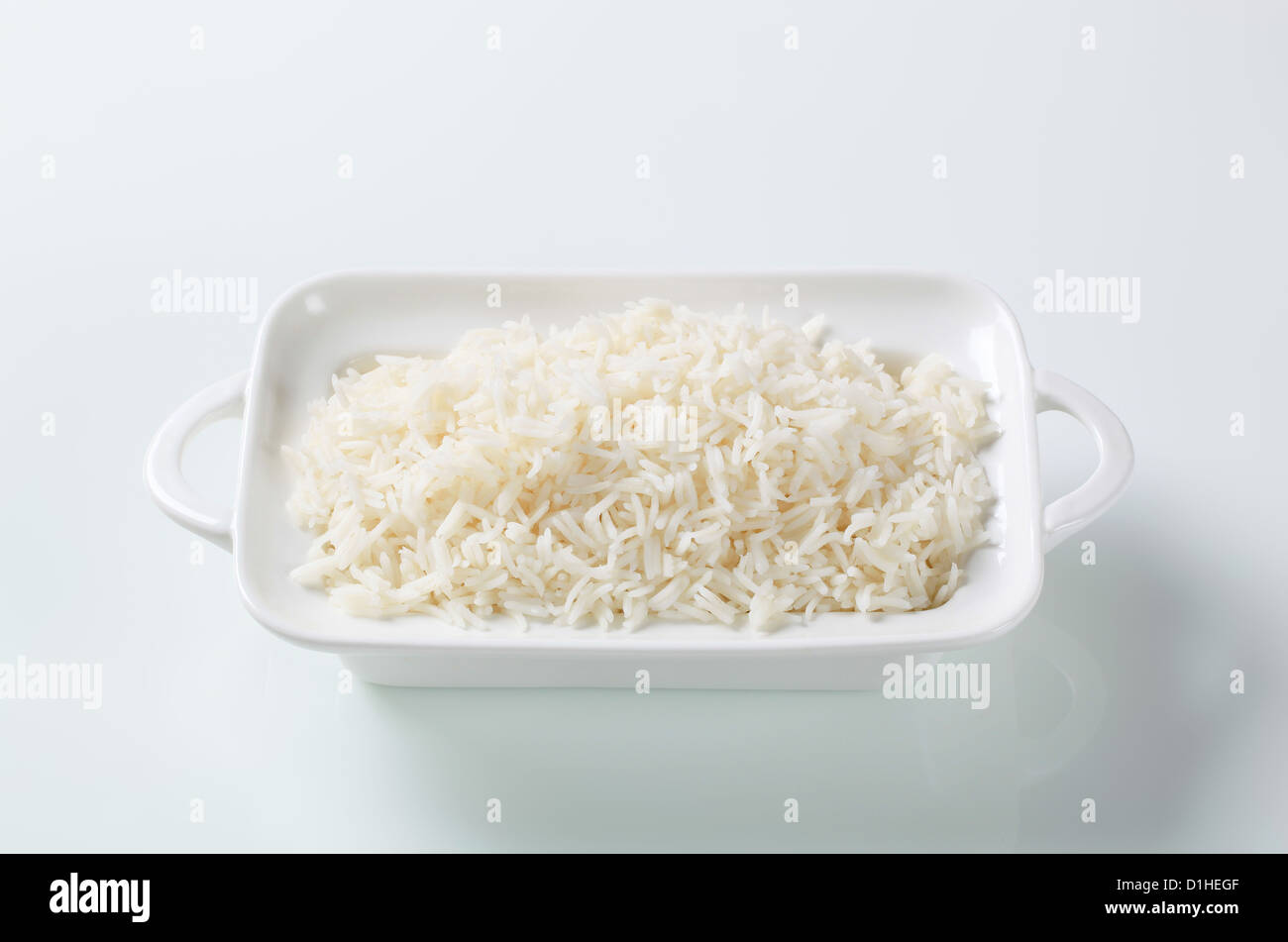 Boiled white rice in a porcelain dish Stock Photo - Alamy