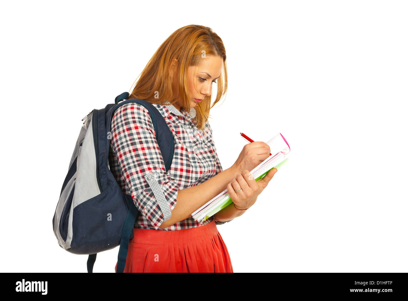 Student woman taking notes isolated on white background Stock Photo - Alamy
