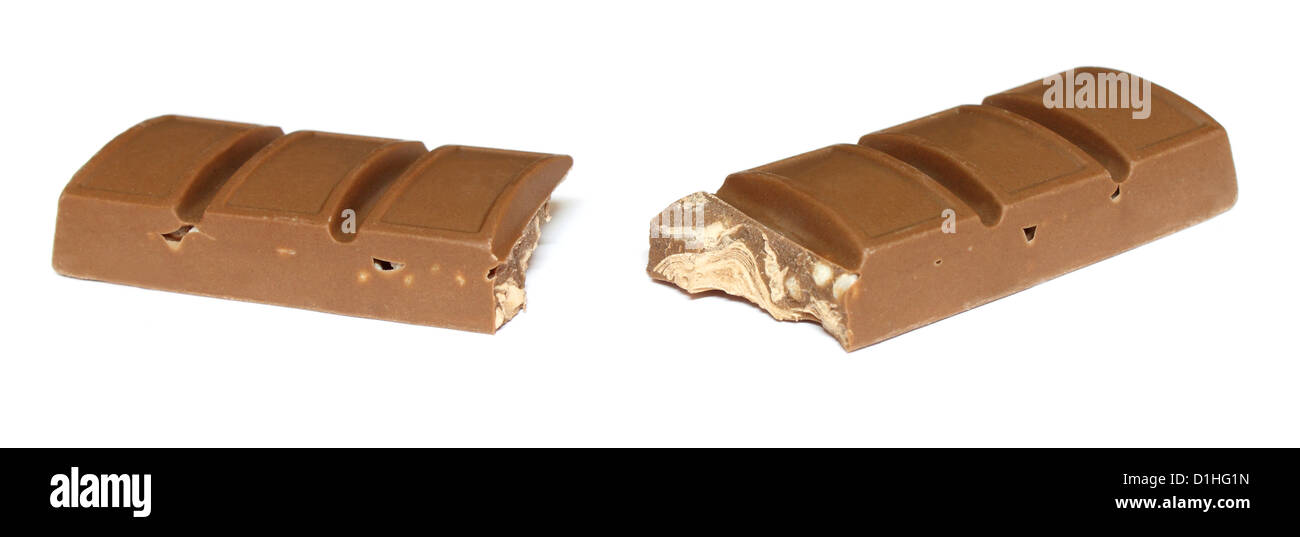 Broken chocolate bar over white background Stock Photo - Alamy