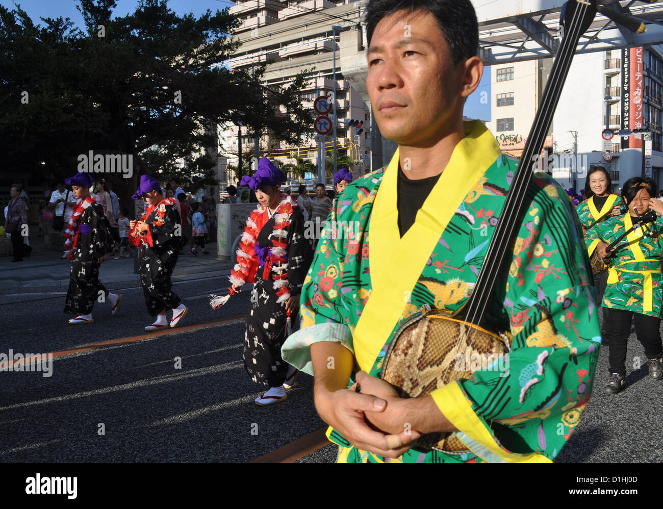 Naha, Okinawa, Japan, traditional Okinawan group along Kokusai-dori ...