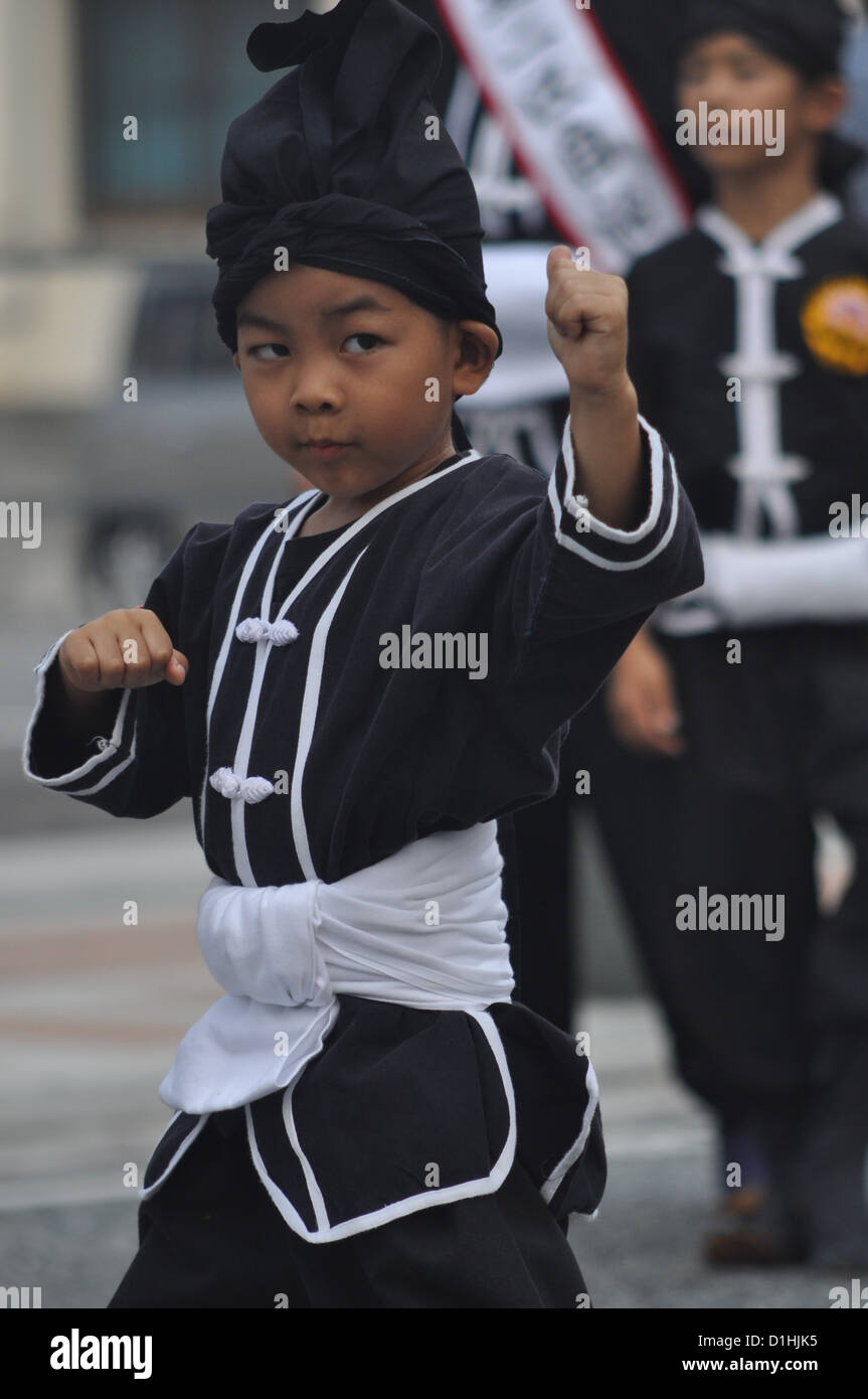 Naha, Okinawa, Japan, children in traditional Okinawan outfit along ...