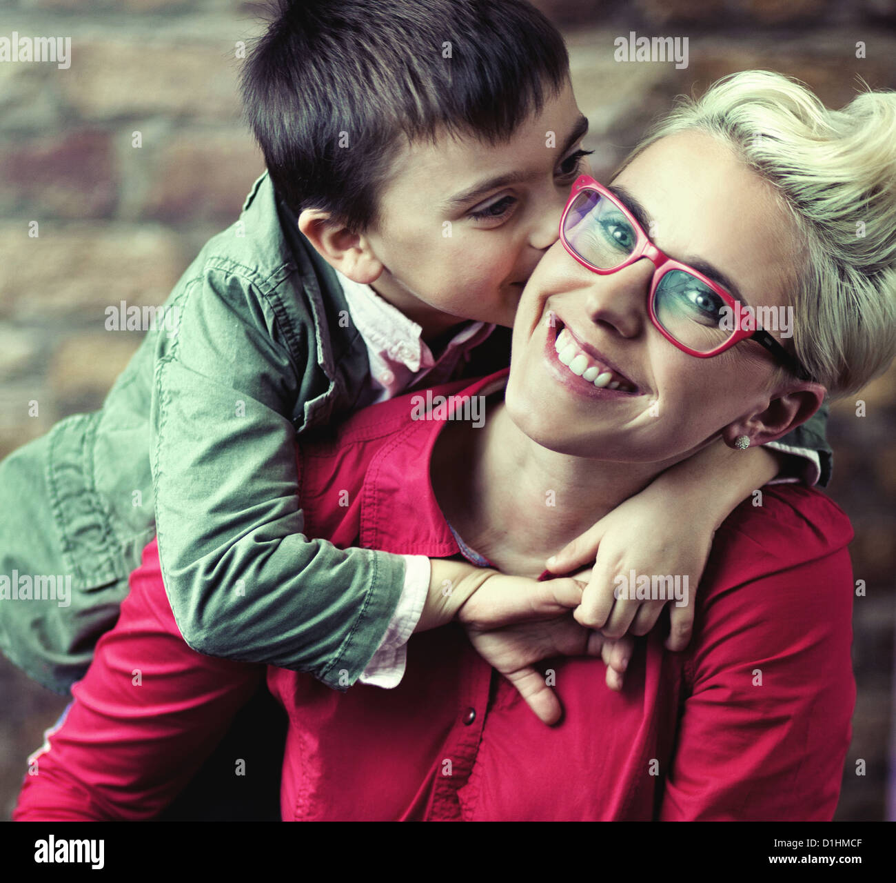 Joyful mother with her cute son Stock Photo - Alamy