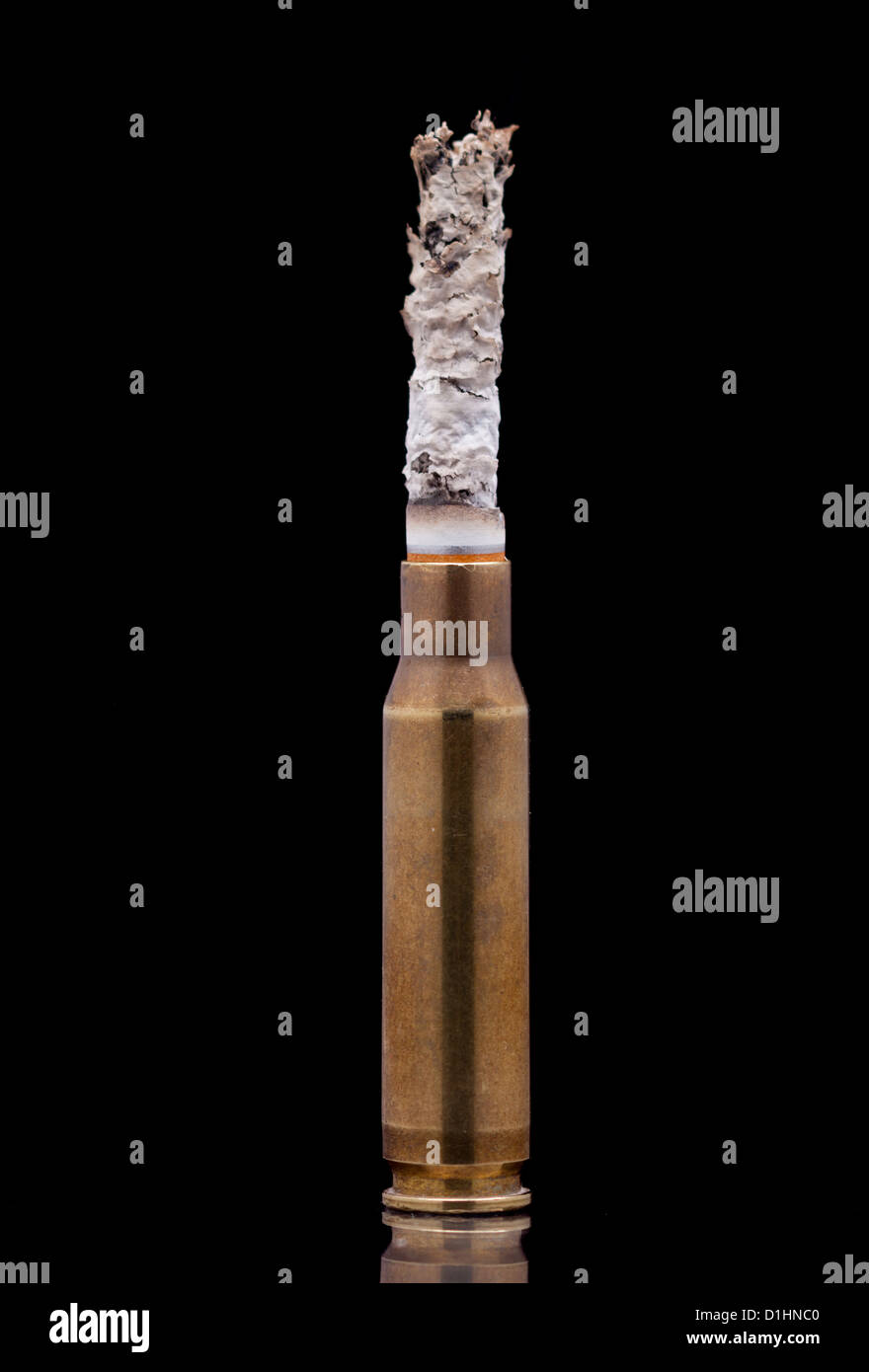 cigarette burned like a bullet isolated black Stock Photo - Alamy
