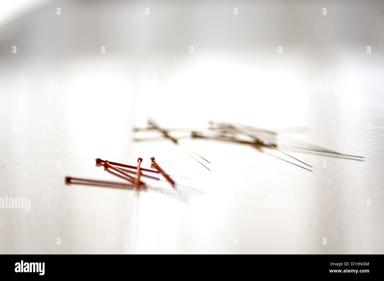 Inserting acupuncture needles hi-res stock photography and images - Alamy