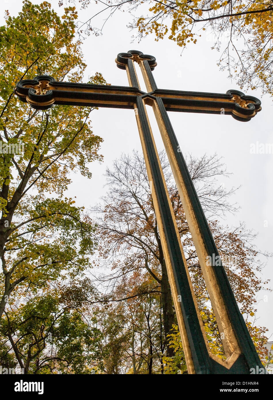 Cast iron neo-gothic cross at the crossroads of the main avenues Stock ...