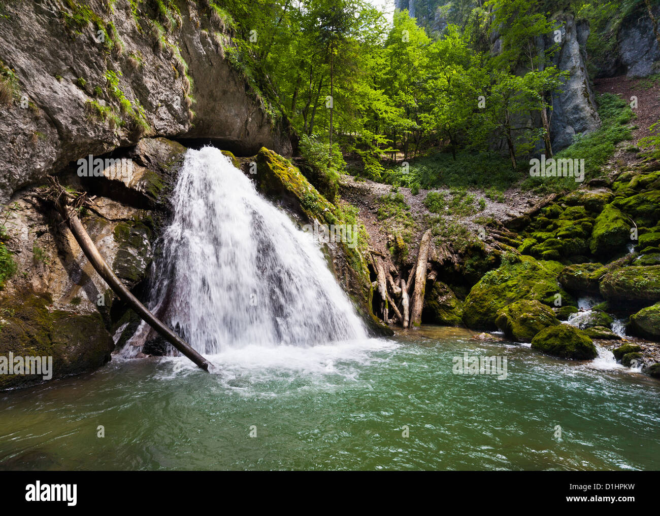 Landscape with a waterfall in a summer day Stock Photo - Alamy