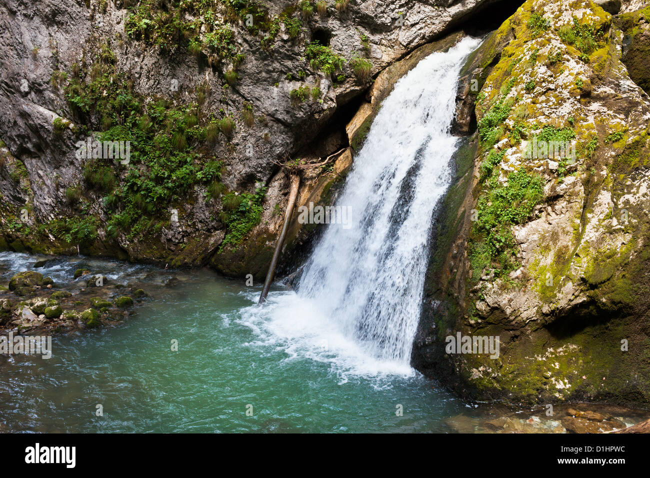 Landscape with a waterfall in a summer day Stock Photo - Alamy