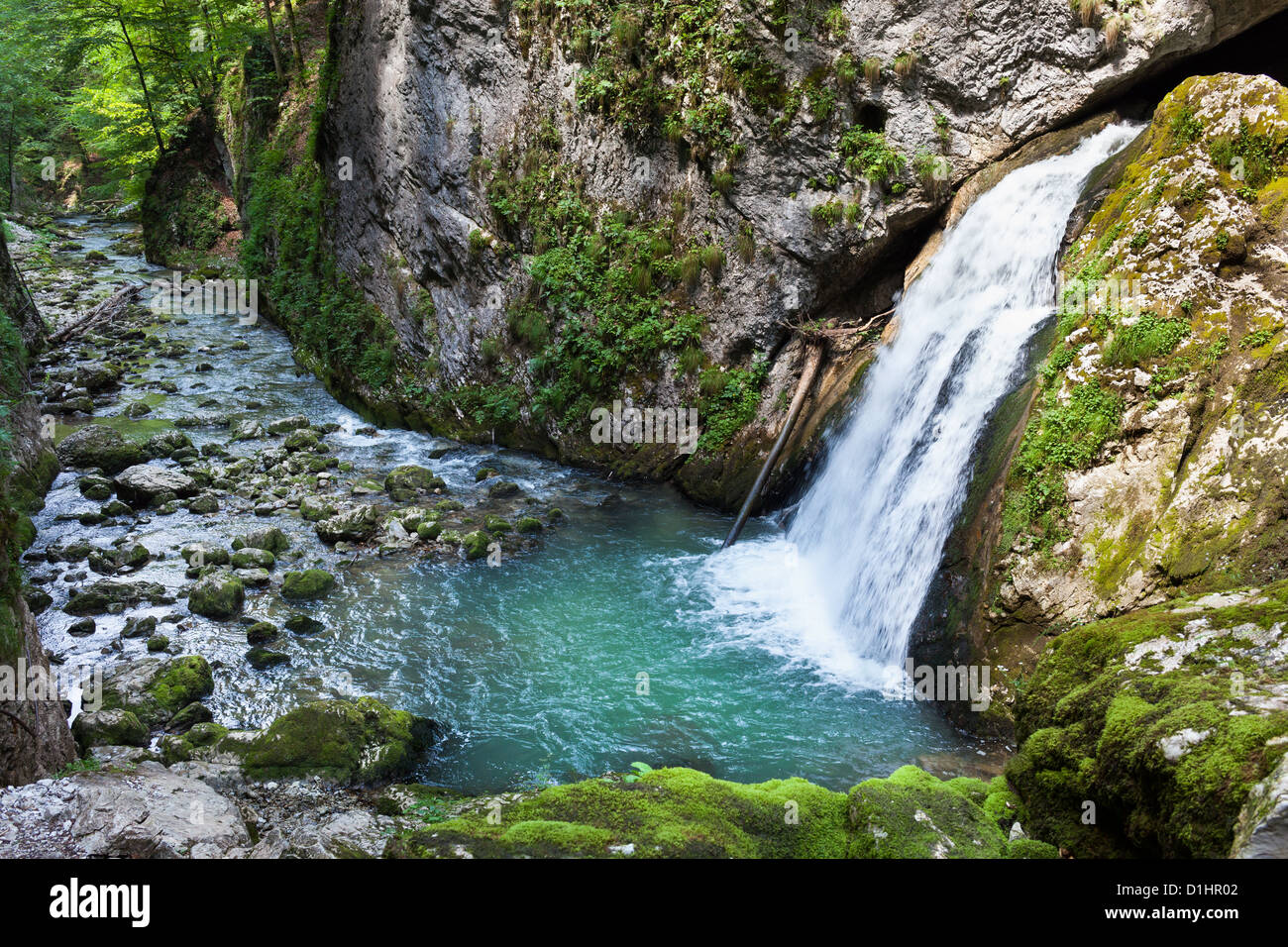 Landscape with a waterfall in a summer day Stock Photo - Alamy