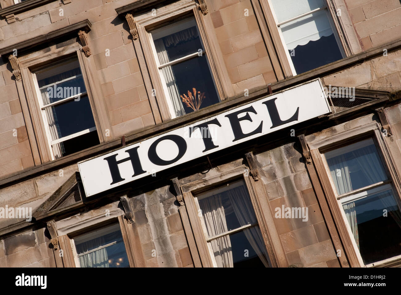 Hotel Sign on Facade on Tilted Angle Stock Photo - Alamy