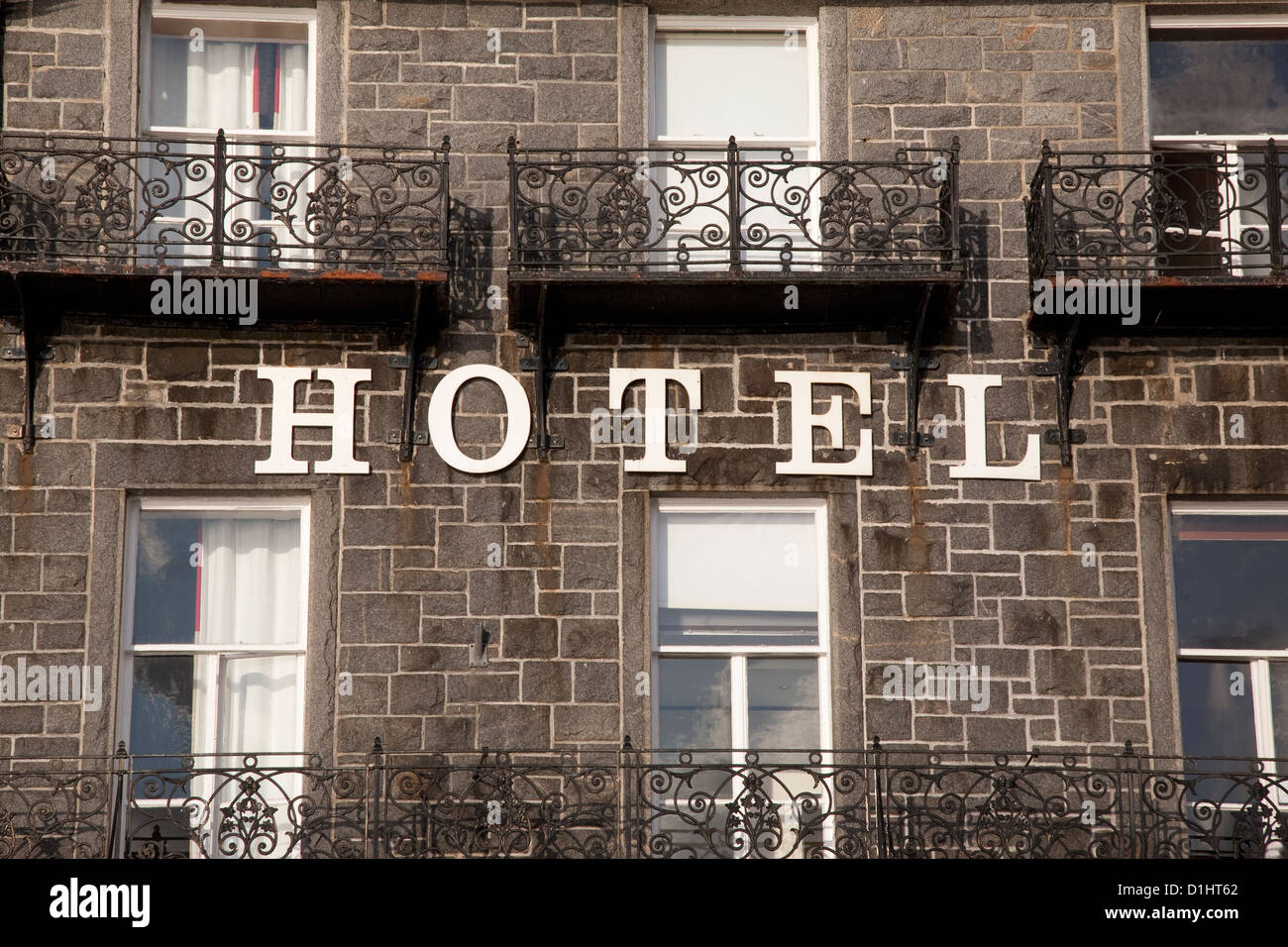 Hotel Sign on Building Facade Stock Photo - Alamy