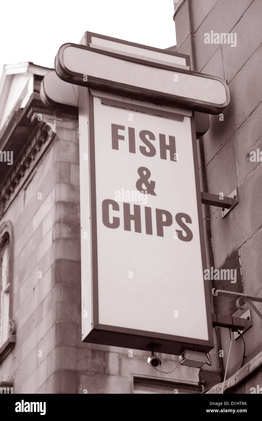 Fish and Chip Shop Sign on Building Facade in Black and White Sepia ...