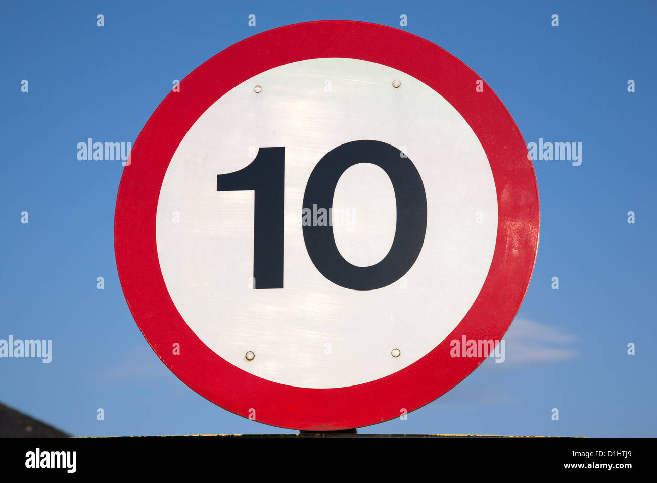 Ten Speed Limit Sign on Blue Sky Background Stock Photo - Alamy