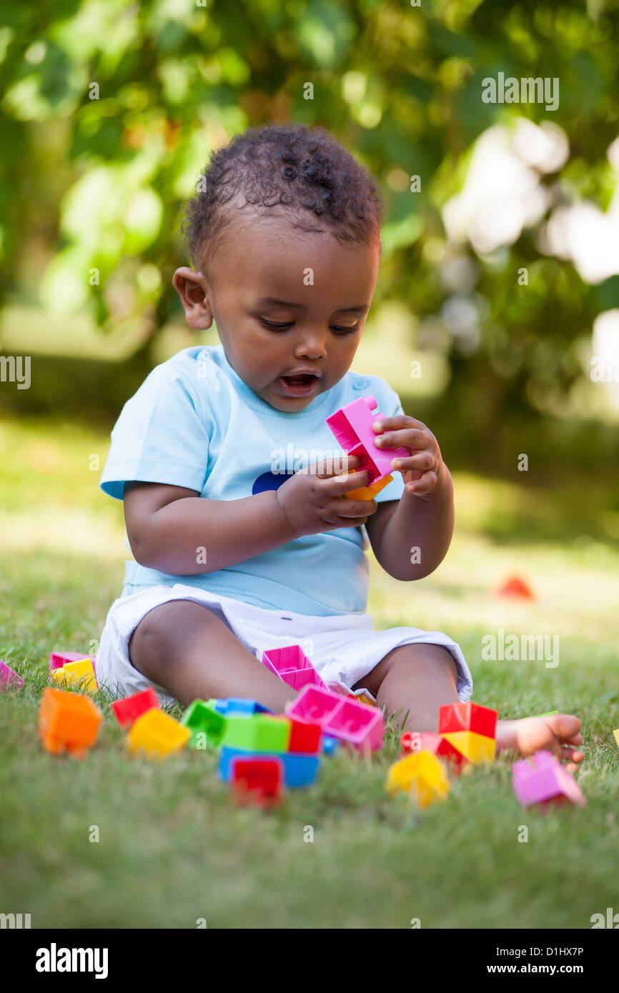 Portrait Of A Little African American Baby Boy Playing Outdoor