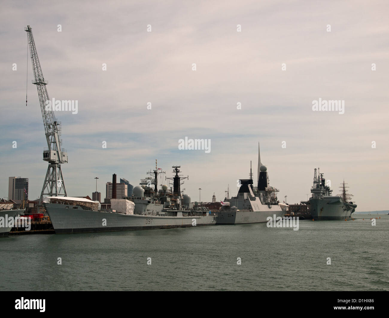 Line of Royal Navy warships in Portsmouth Harbour Hampshire England UK ...