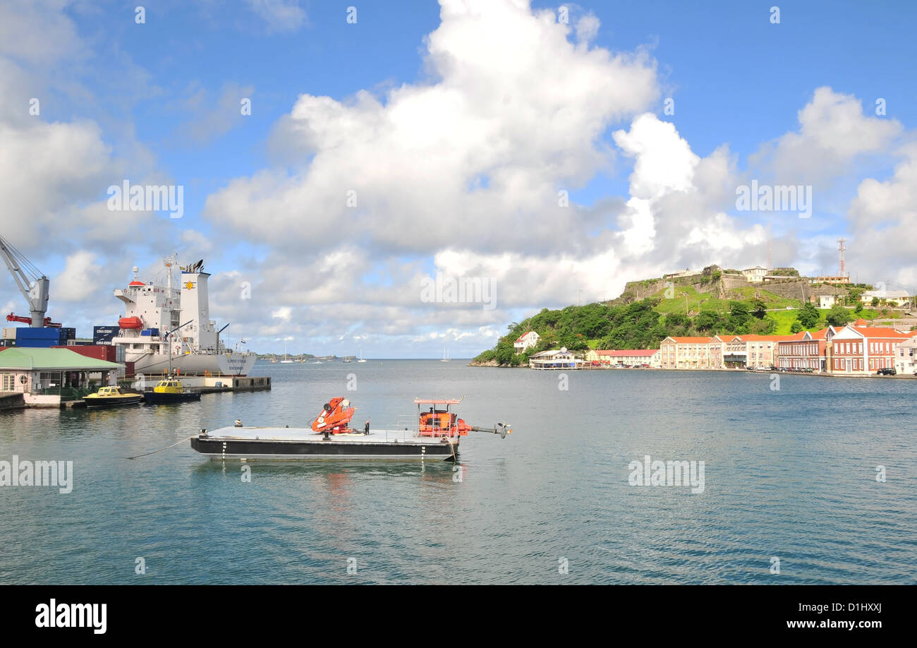 Blue sky white clouds view, to Fort George, small barge, container ship ...