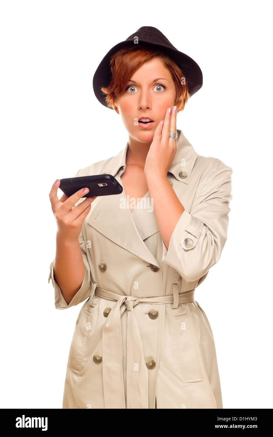 Shocked Young Woman Holding Smart Cell Phone Isolated on a White ...