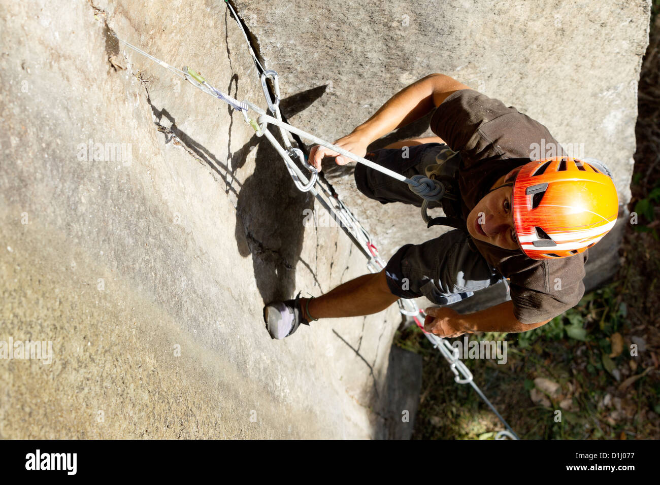 Athletic man climbing mountain close hi-res stock photography and ...