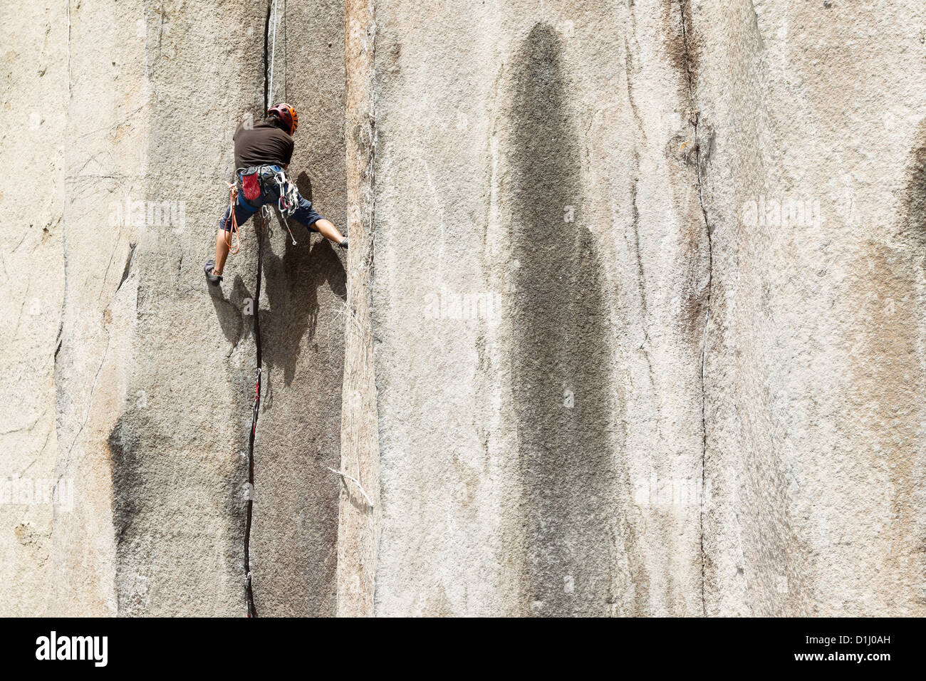 Rock Climb On A Perfect Vertical Aerial Rock Stock Photo - Alamy