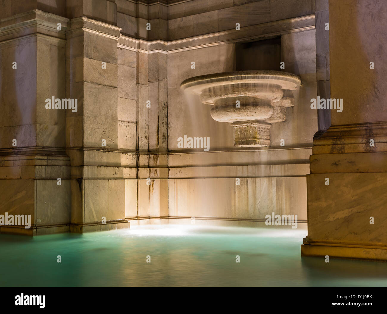 Water fountain at night with flowing water in Rome, Italy Stock Photo ...
