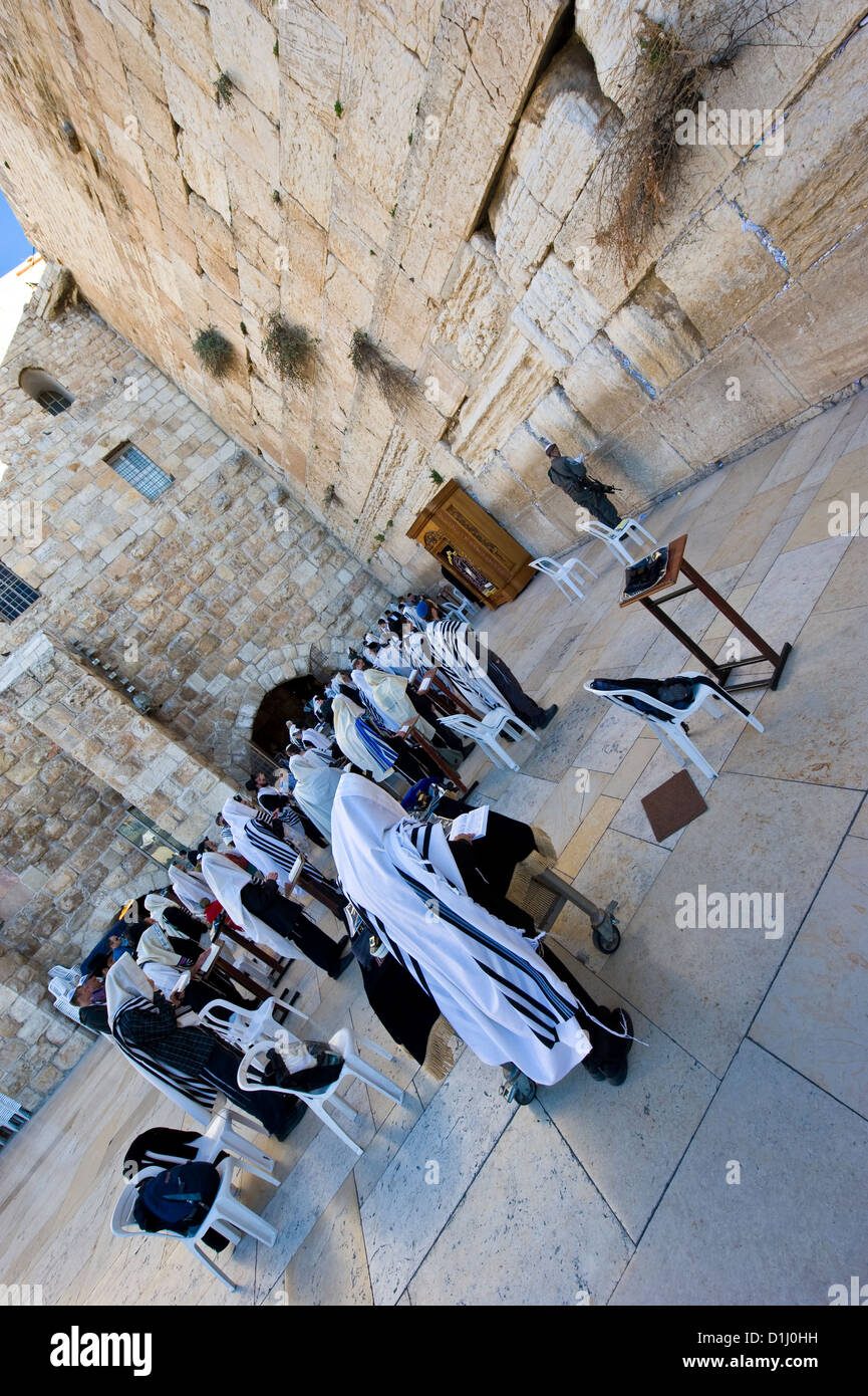 Praying at the Western Wall in Jerusalem Stock Photo - Alamy