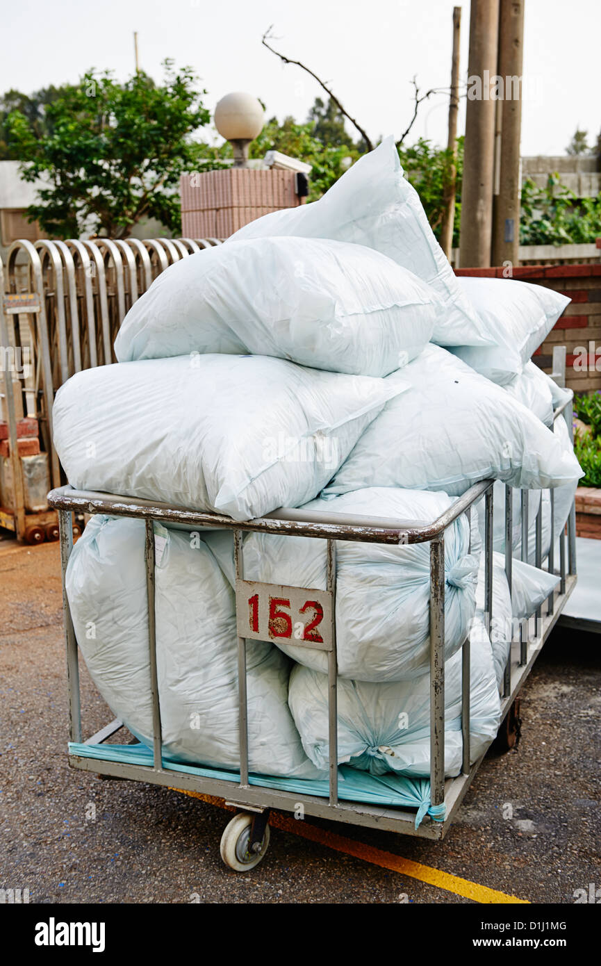 Large white sacks of fabric Stock Photo - Alamy