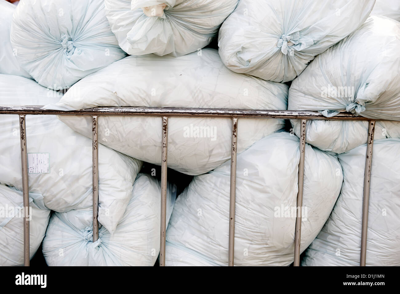 Large white sacks of fabric Stock Photo - Alamy