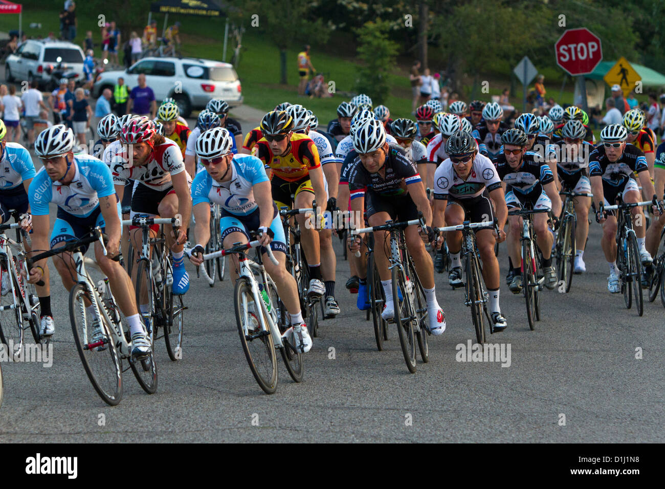 Pack of racing cyclists Stock Photo - Alamy