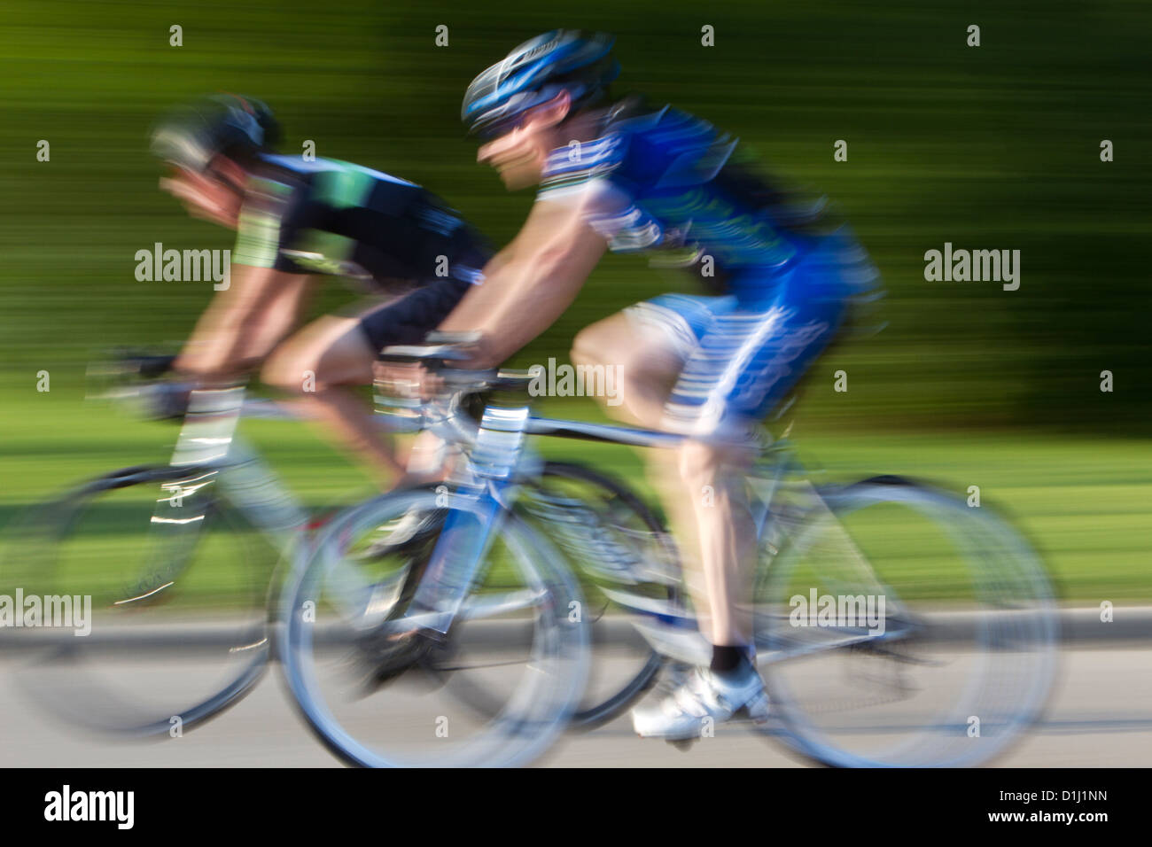 Two racing cyclists Stock Photo - Alamy