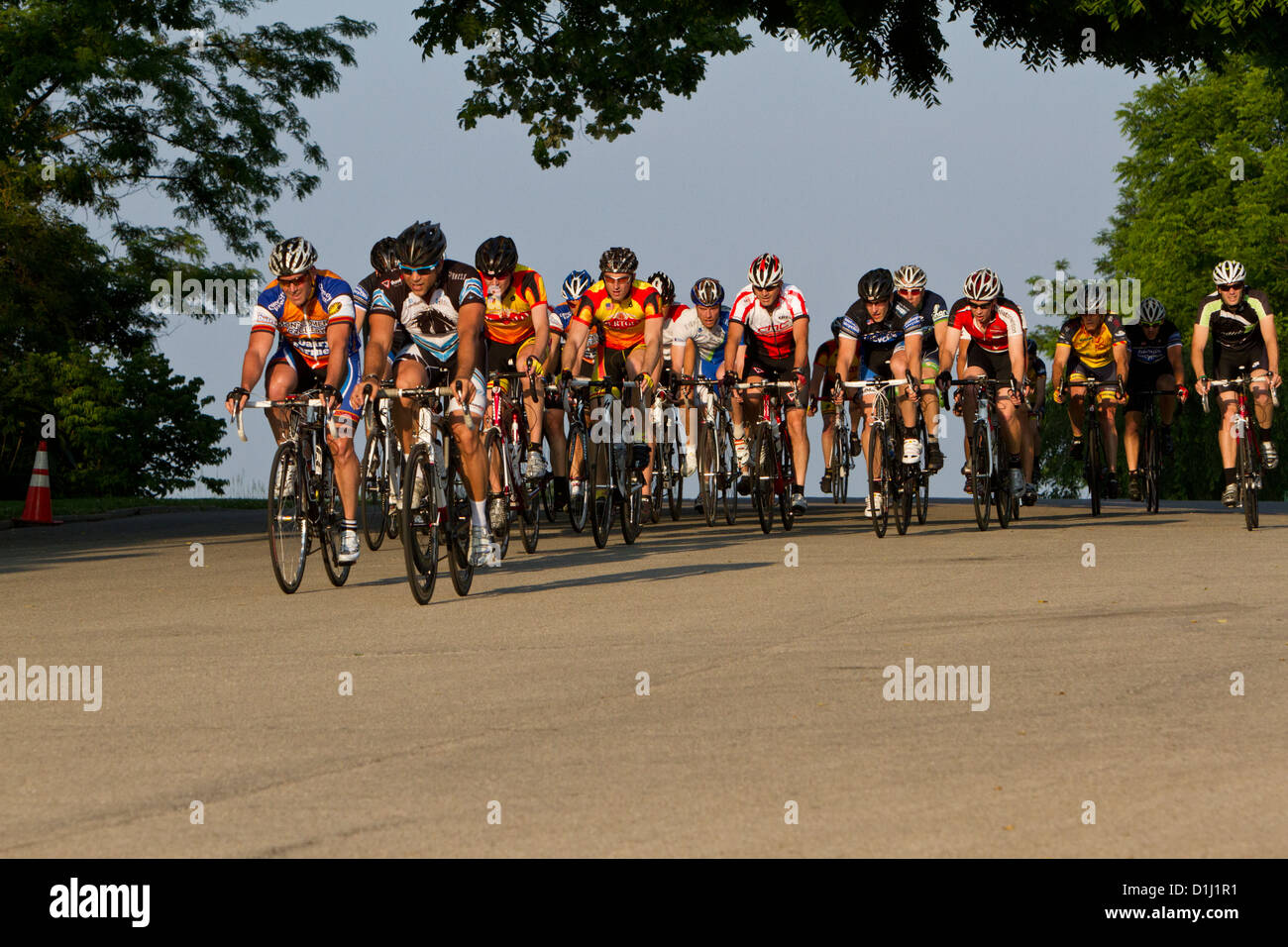 Pack of racing cyclists Stock Photo - Alamy