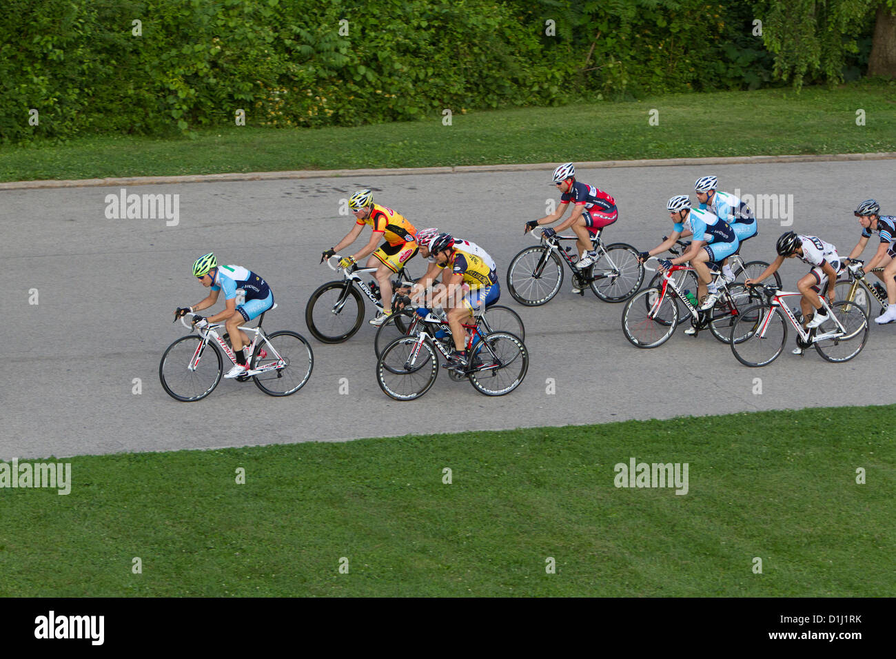 Pack of racing cyclists Stock Photo - Alamy