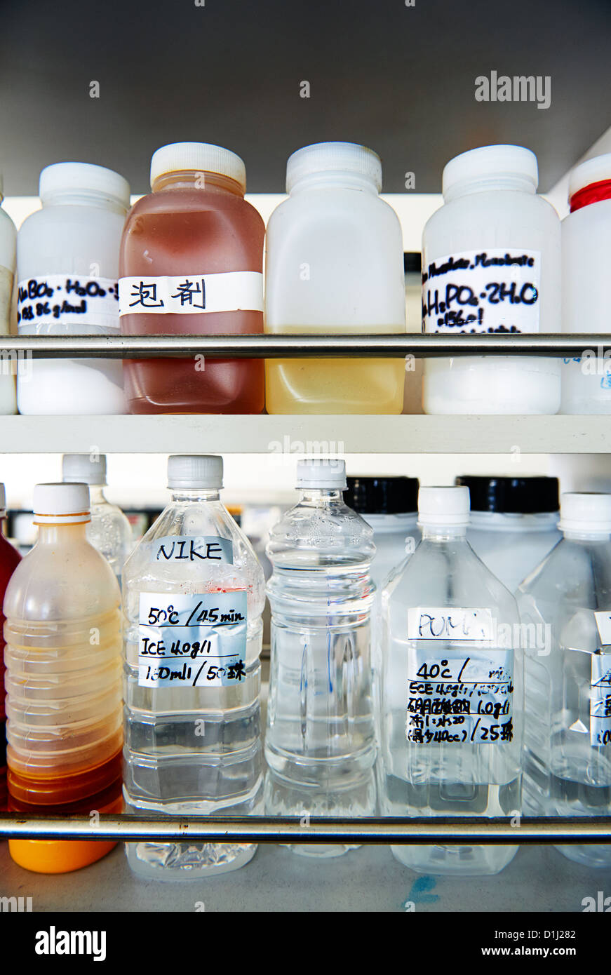Chemical samples and mixtures at a fabric factory Stock Photo - Alamy