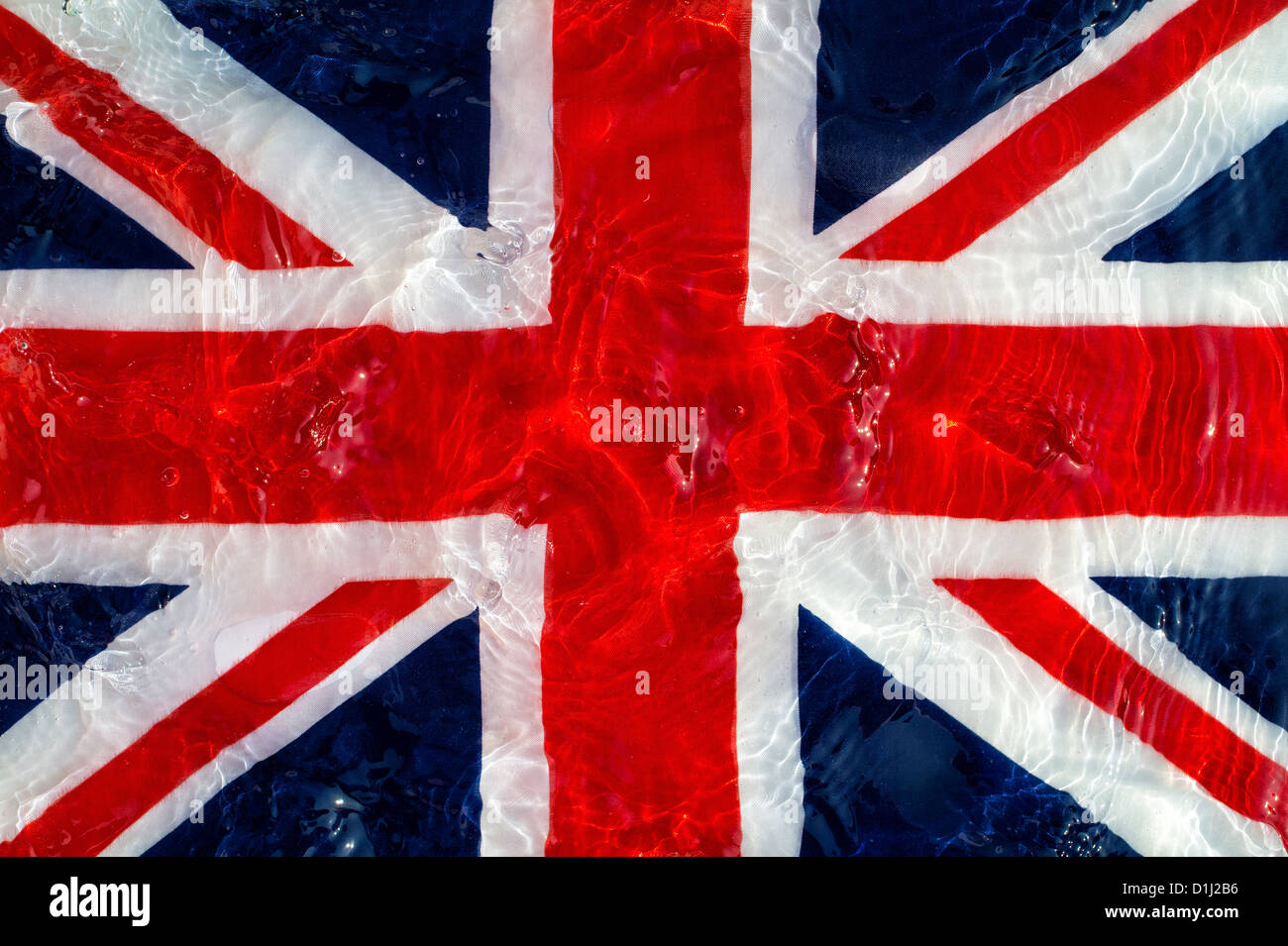 Union jack flag covered in rippling water. Concept for a wet flooded ...