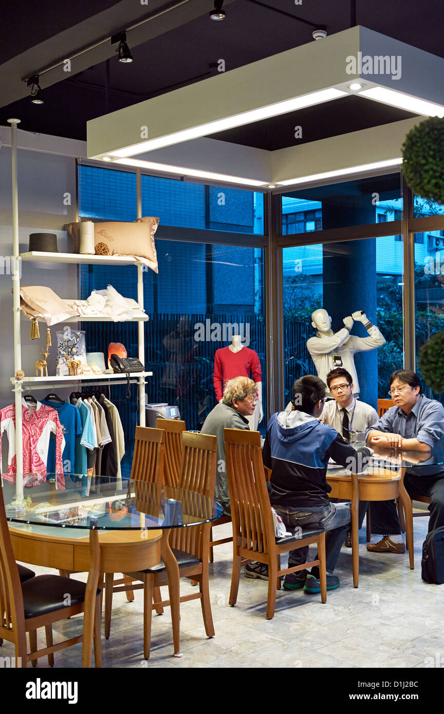 The factory showroom of a fabrics manufacturer where clients meet and ...