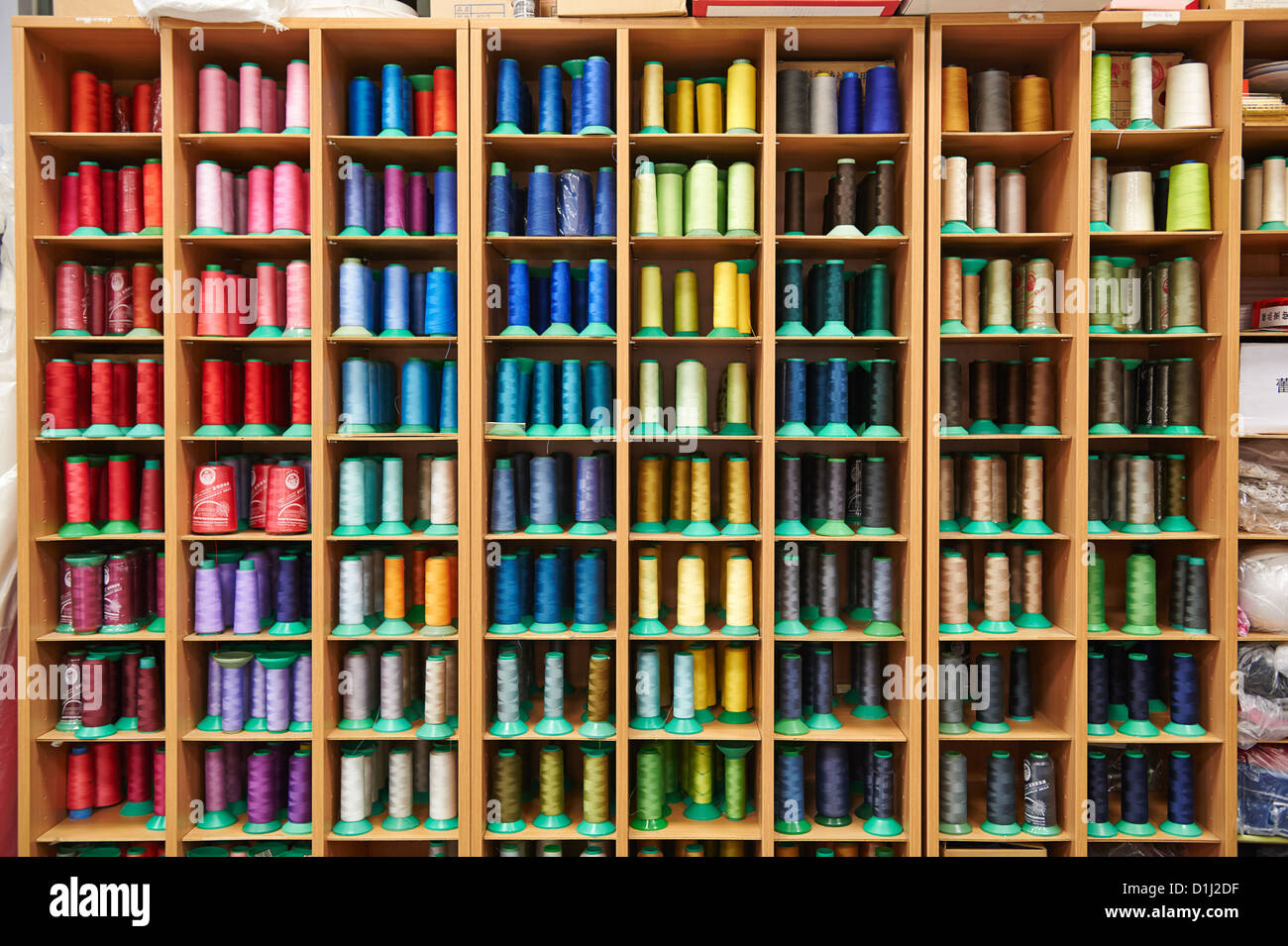 A colorful display of thread rolls Stock Photo - Alamy