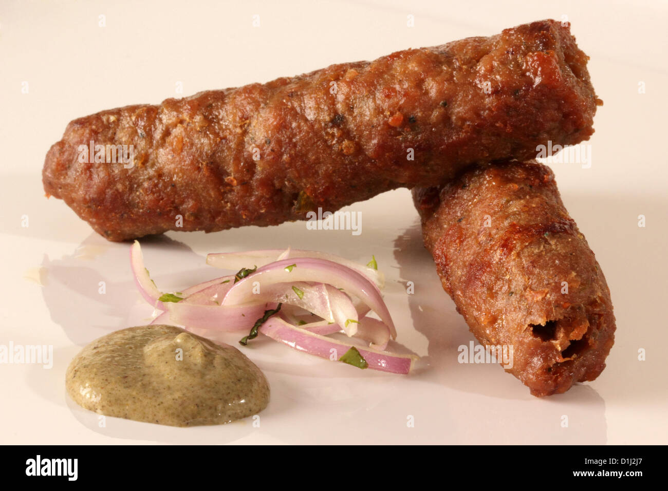 Hot fresh spicy mutton seekh kebab Stock Photo - Alamy
