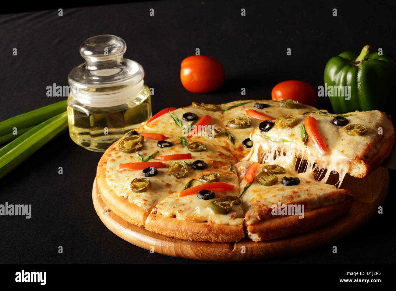 Delicious Vegetable cheese pizza Stock Photo - Alamy