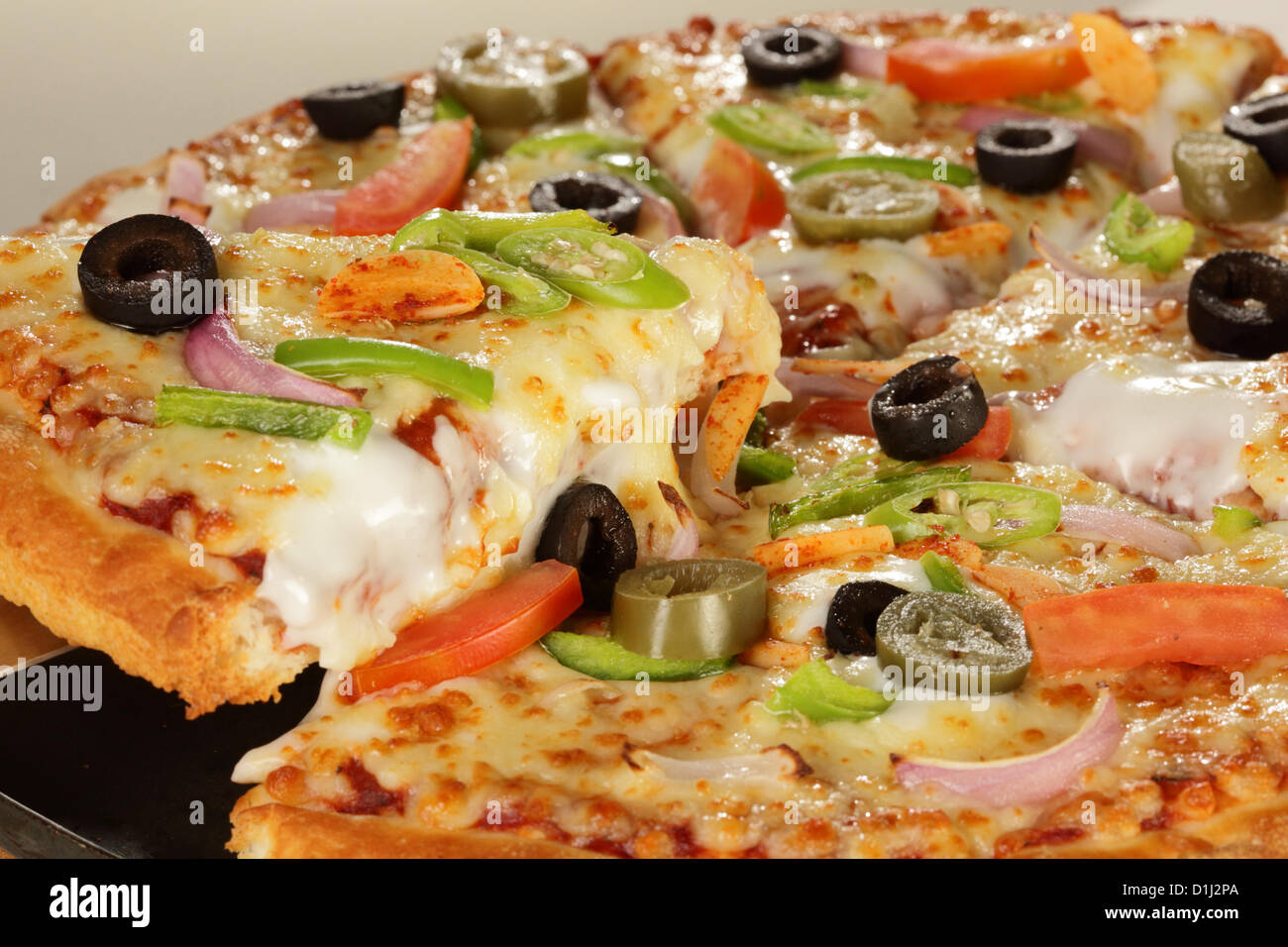 Delicious Vegetable cheese pizza Stock Photo - Alamy