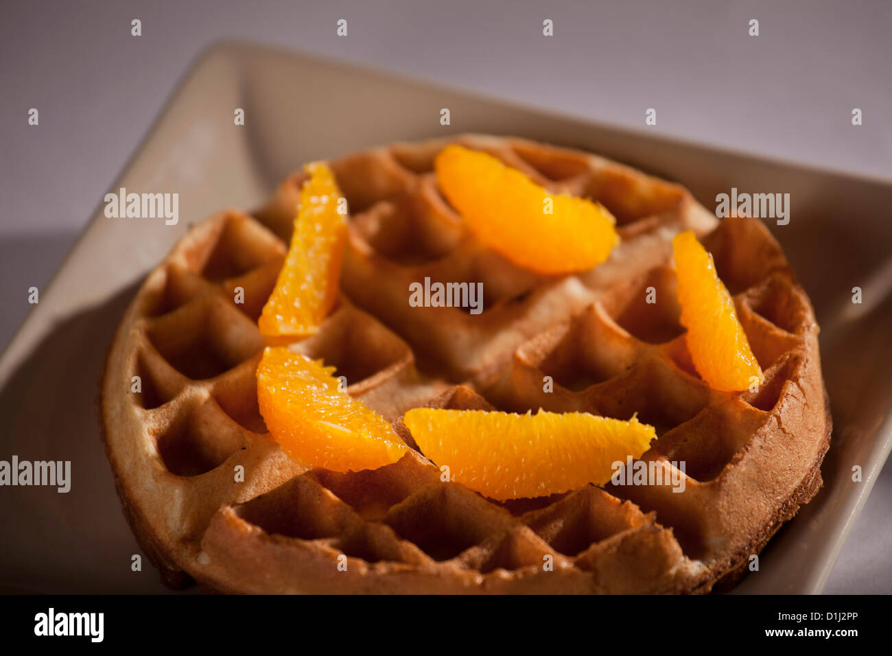 waffles with orange on top Stock Photo - Alamy