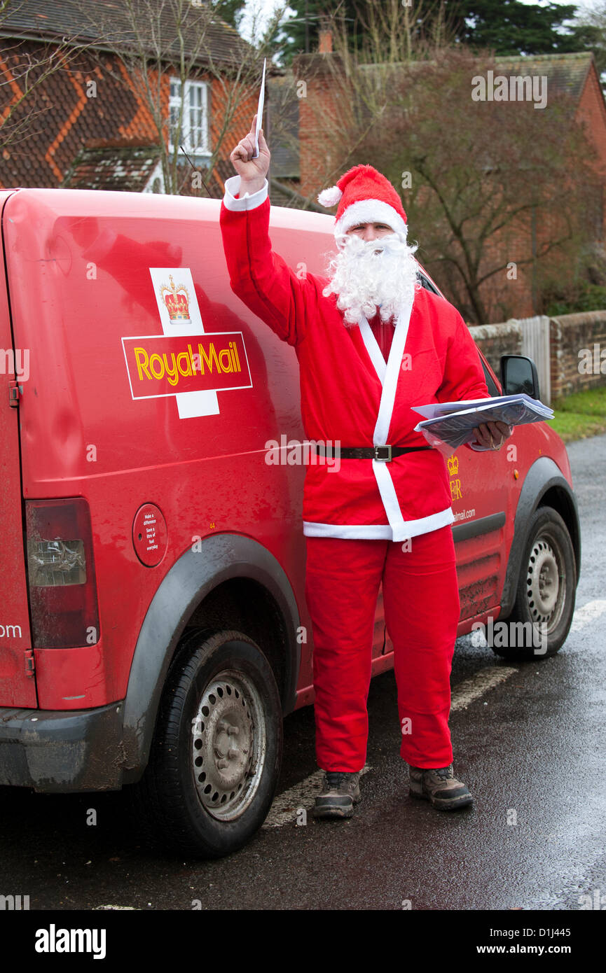 Postman G Lee who works out of Basingstoke dressed as Santa making ...